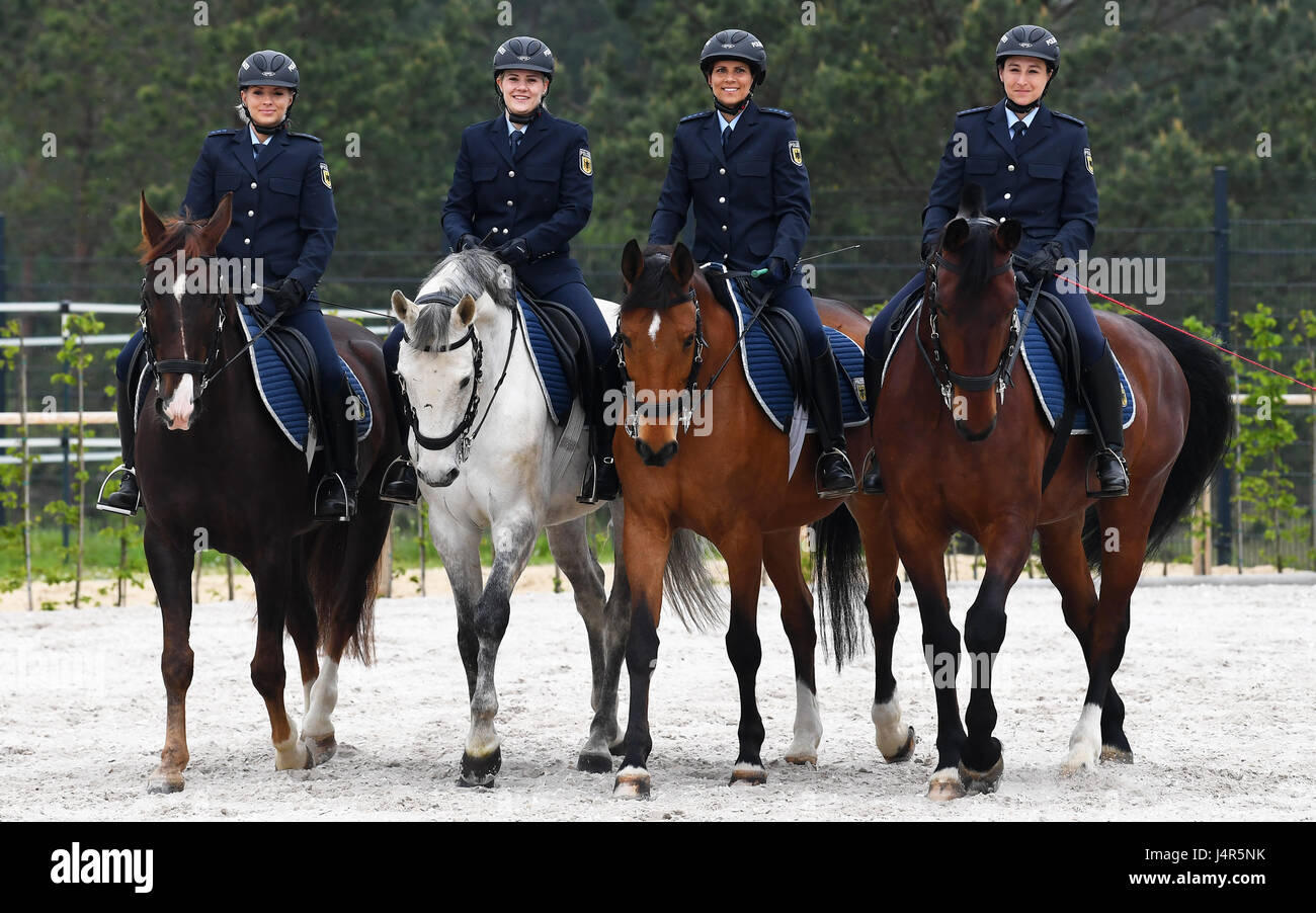 Mounted police officers can be seen during the open day on the grounds ...