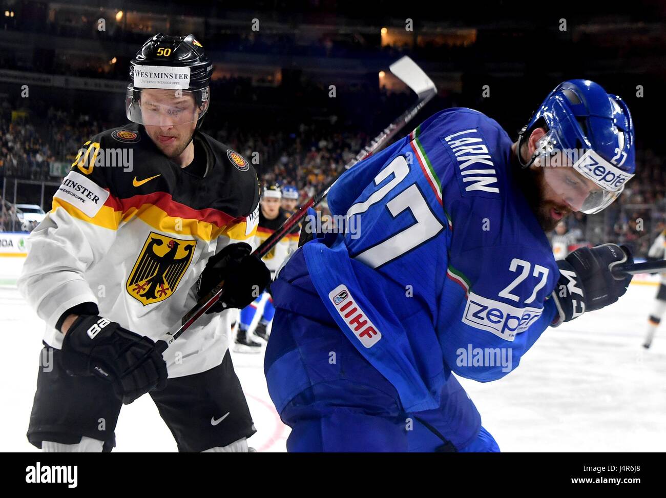 Cologne, Germany. 13th May, 2017. Italy's Thomas Larkin (r) and Germany ...