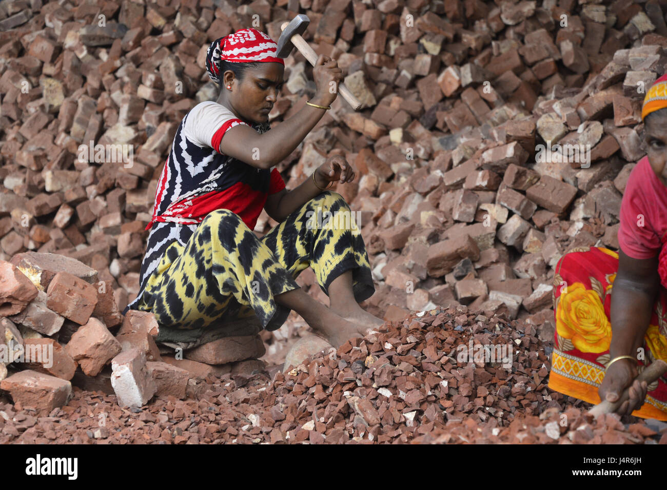 Woman breaking bricks hi-res stock photography and images - Alamy
