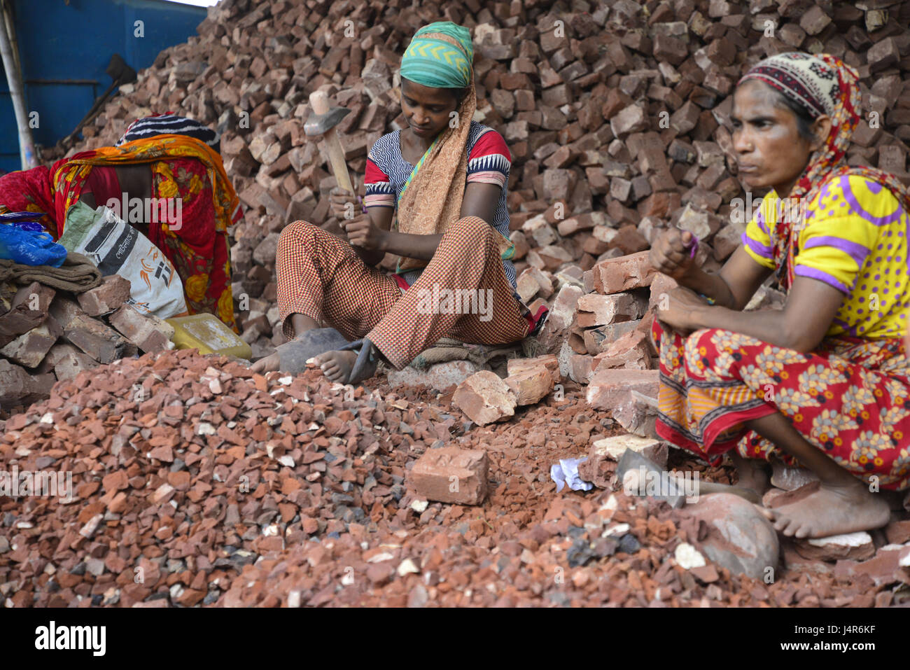 Dhaka, Bangladesh. 13th May, 2017. Bangladeshi women break bricks at ...
