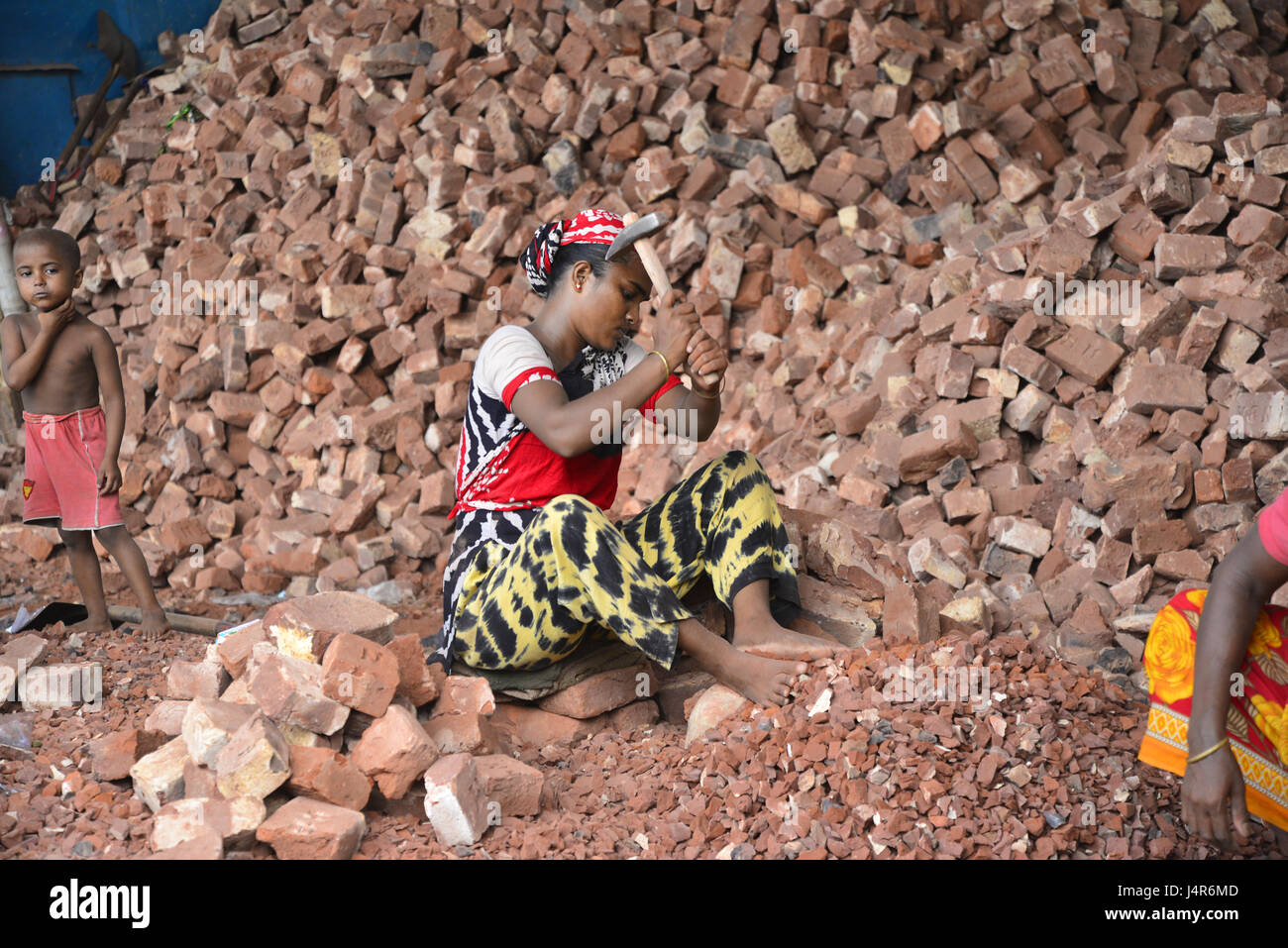 Dhaka, Bangladesh. 13th May, 2017. Bangladeshi women break bricks at ...