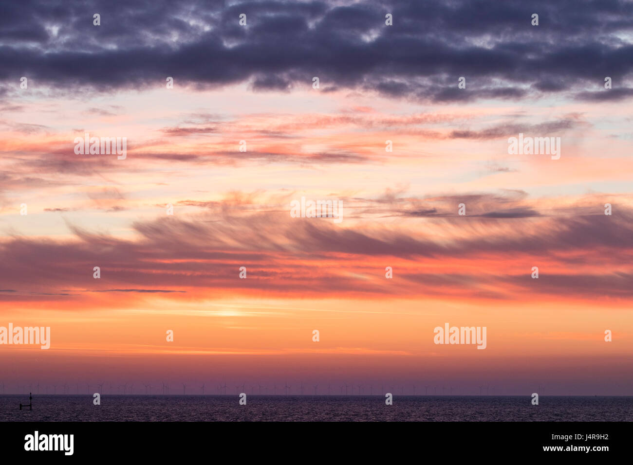 England, Ramsgate. Dawn sky over the Thanet offshore wind farm on the ...