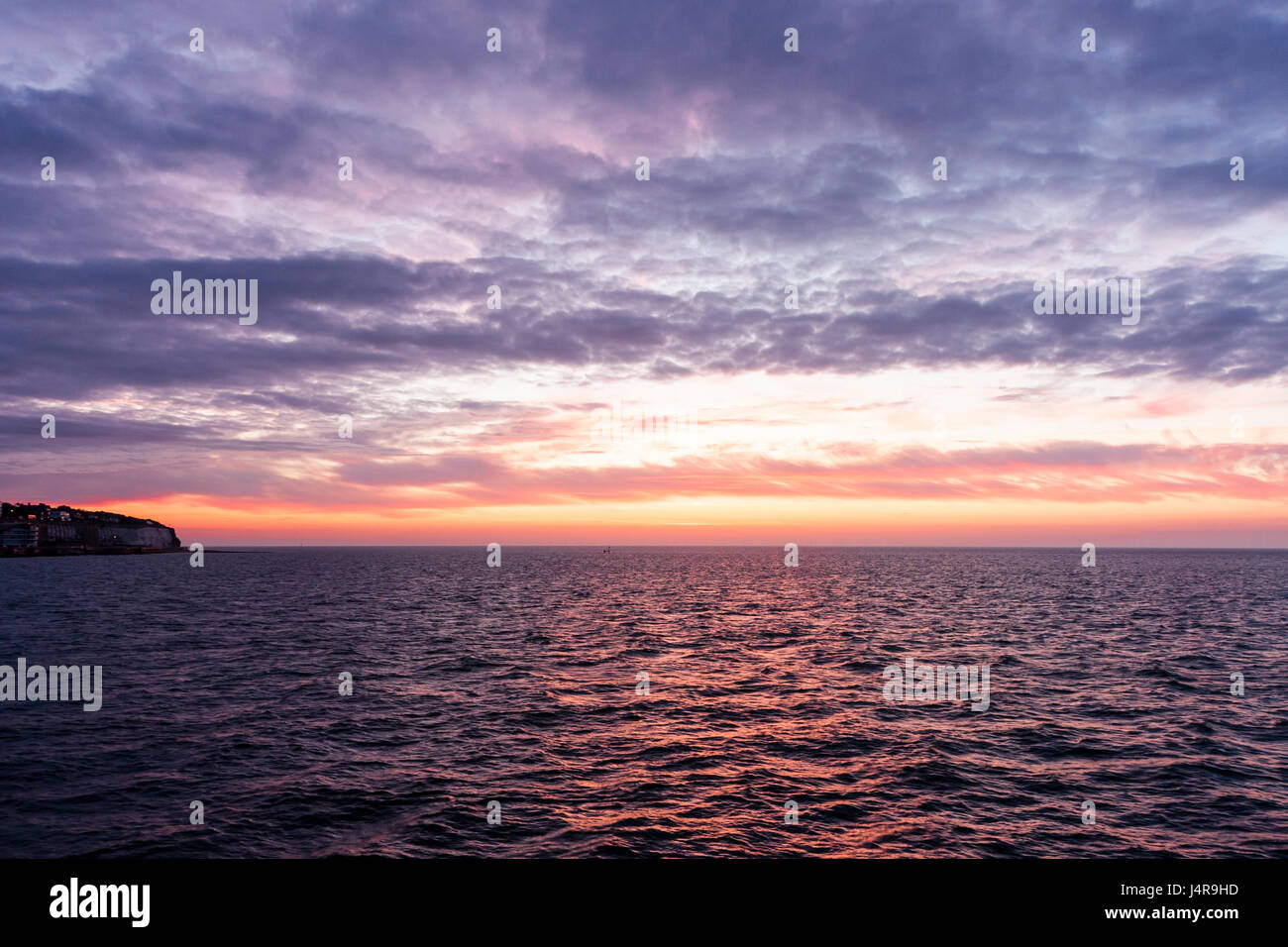 England, Ramsgate. Dawn sky over the Thanet offshore wind farm on the ...