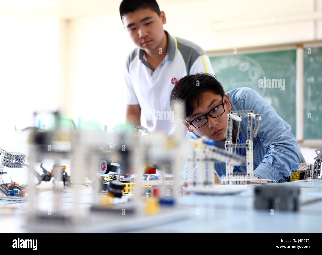 Tianjin, China. 14th May, 2017. Contestants compete during the ...
