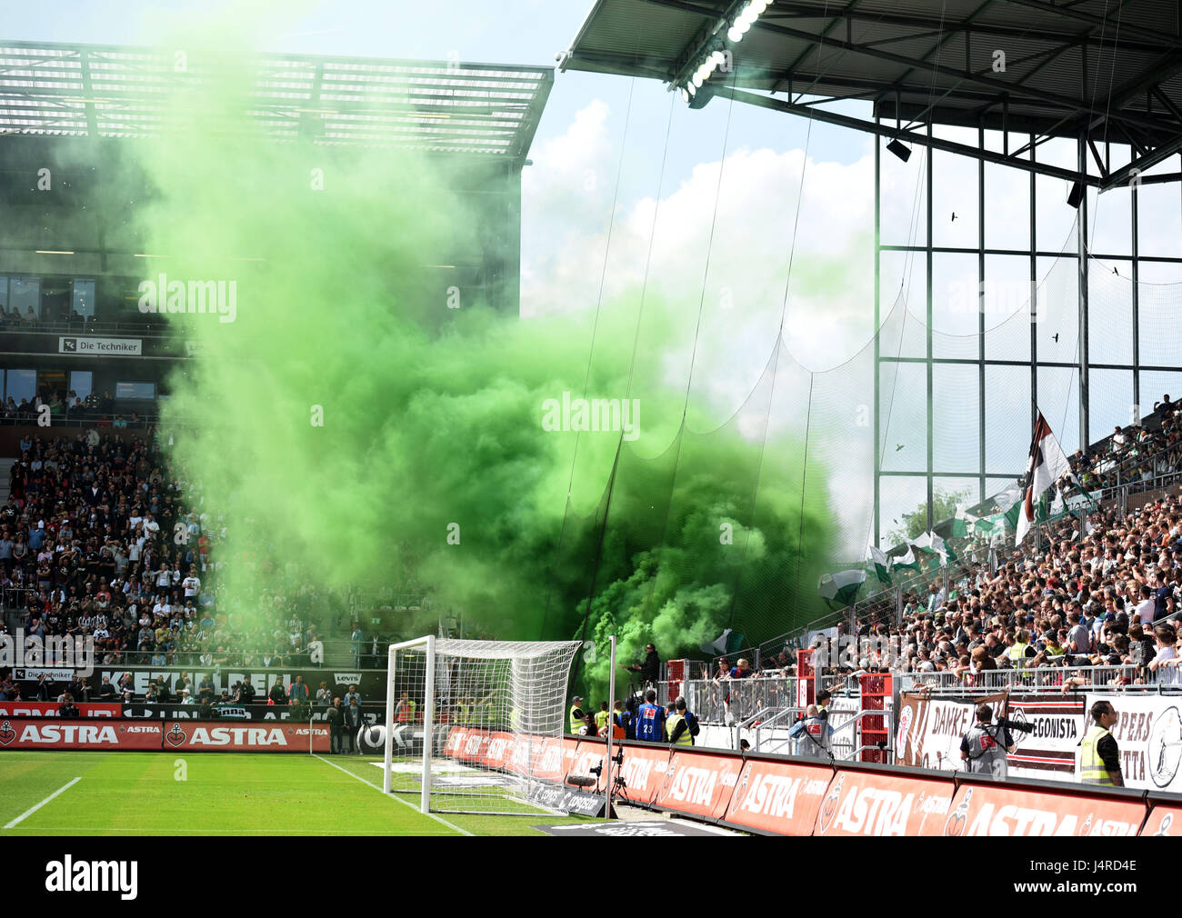 Hamburg, Germany. 14th May, 2017. Fuerth's fans light pyrotechnics ...