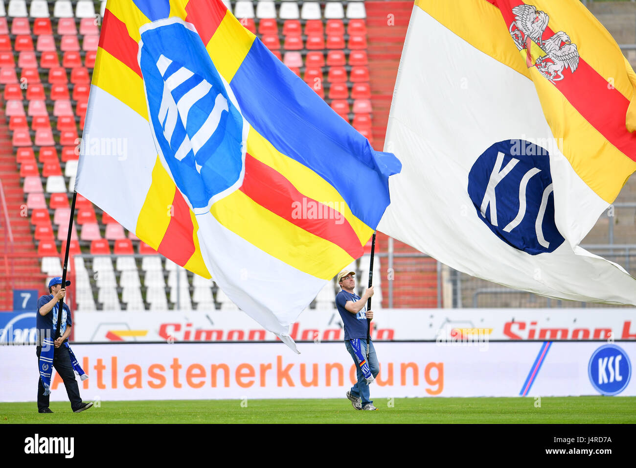 Karlsruhe, Germany. 14th May, 2017. Karlsruhe fans wave flags in front ...