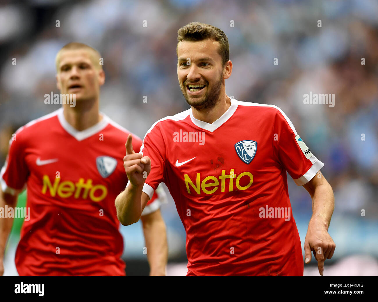 Munich, Germany. 14th May, 2017. Bochum's Tom Weilandt (r) celebrates ...