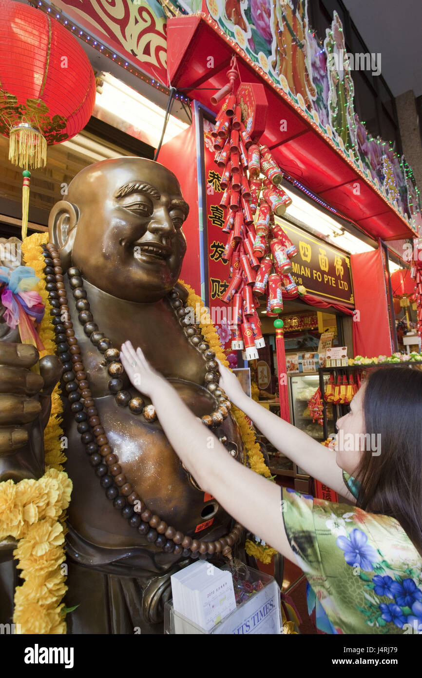 Singapore, Singapore town, Chinatown, Buddha statue, woman, touch Stock ...