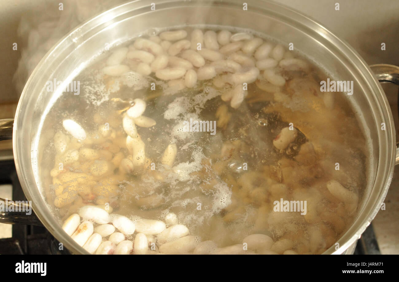 Steam over metal cooking pot at the kitchen Stock Photo - Alamy