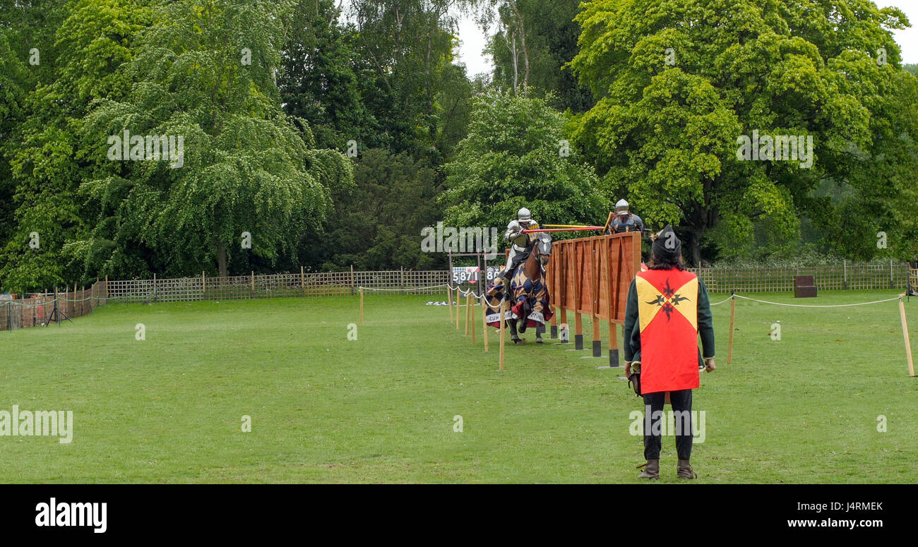 View of a medieval joust with knights in armour and costume Stock Photo ...