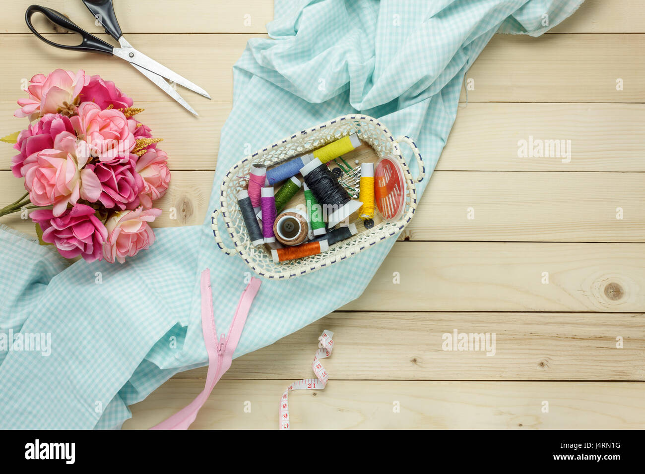 Top view tailor items on wooden background with copy space Stock Photo ...