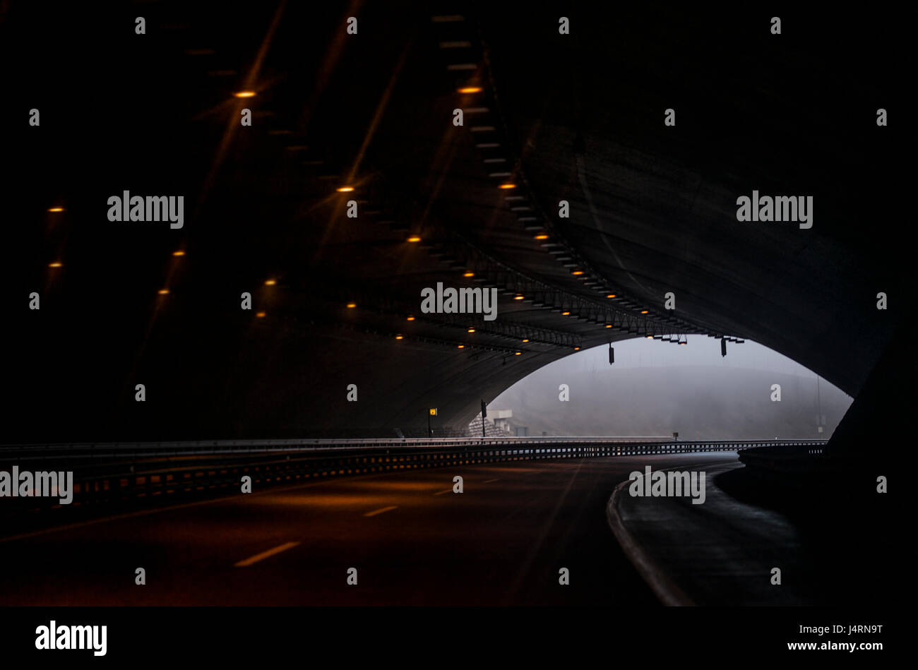 Under a tunnel on a highway road Stock Photo - Alamy