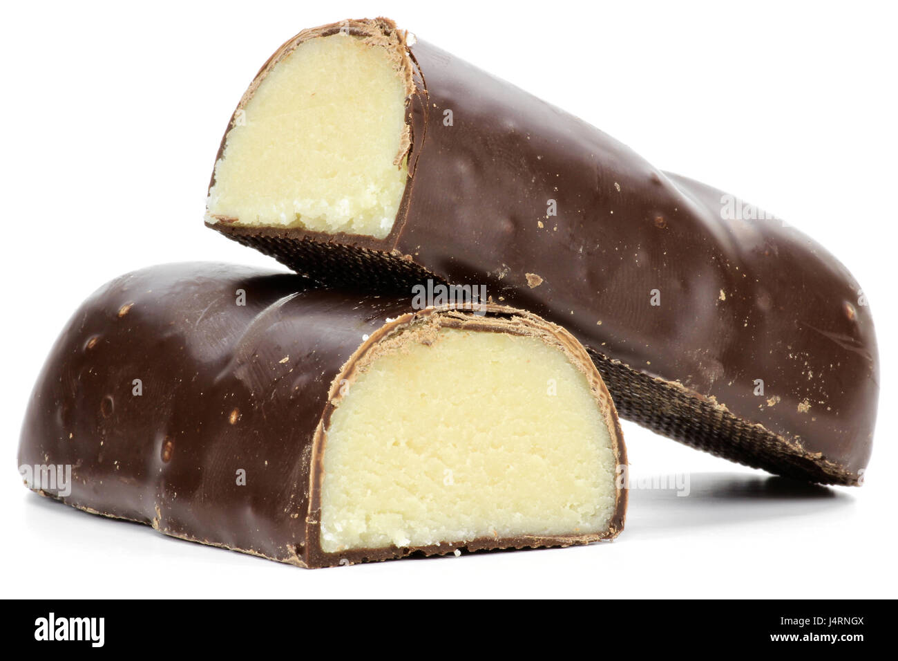 Marzipan loaf made in Lubeck isolated on white background. Lubeck is a ...