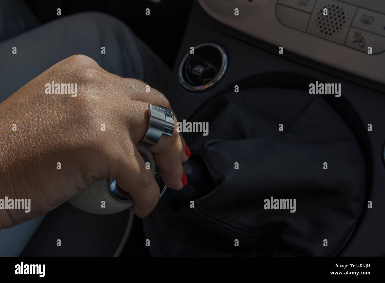 Woman's hand to drive Stock Photo - Alamy
