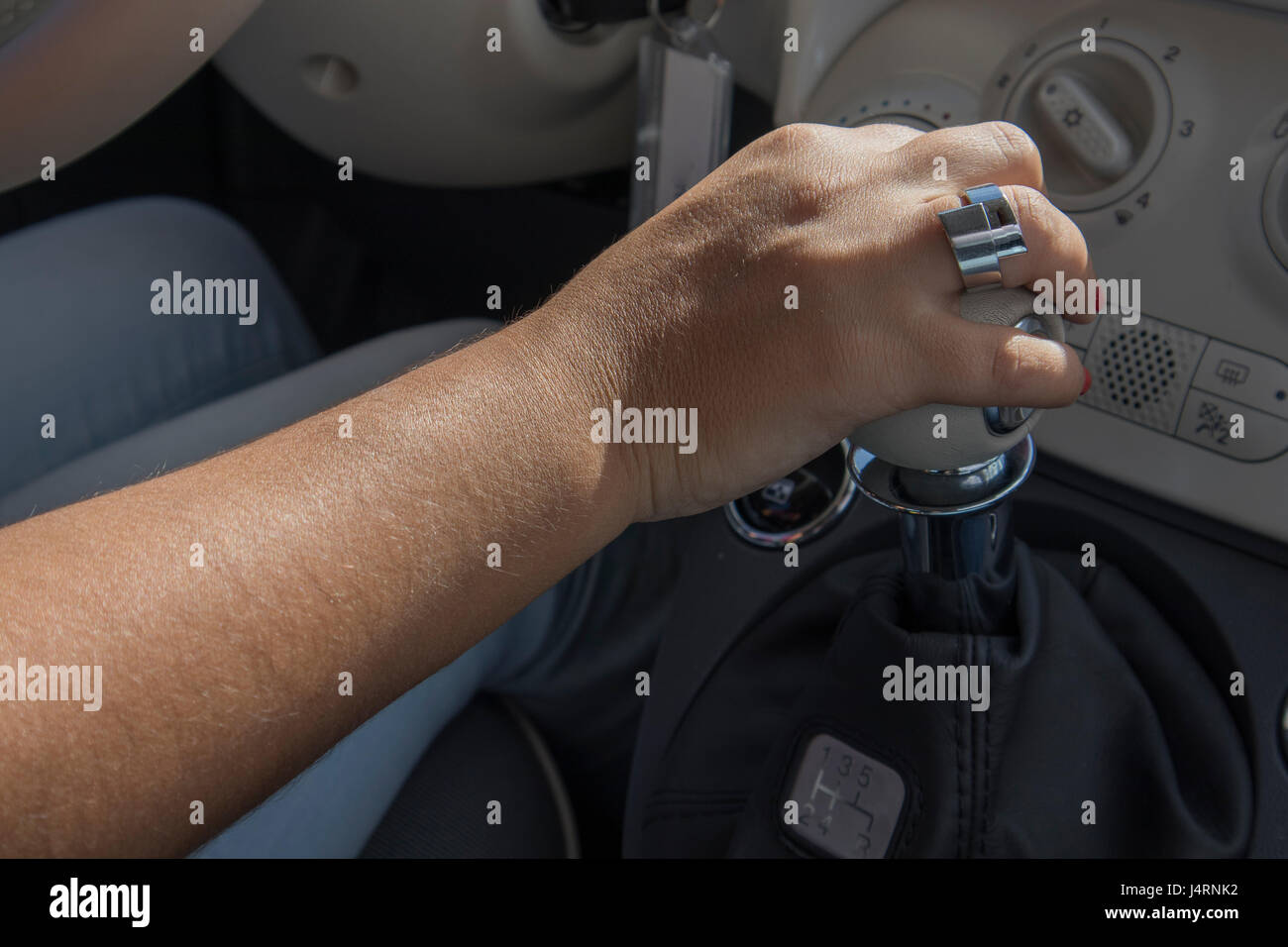 Woman's hand to drive Stock Photo - Alamy