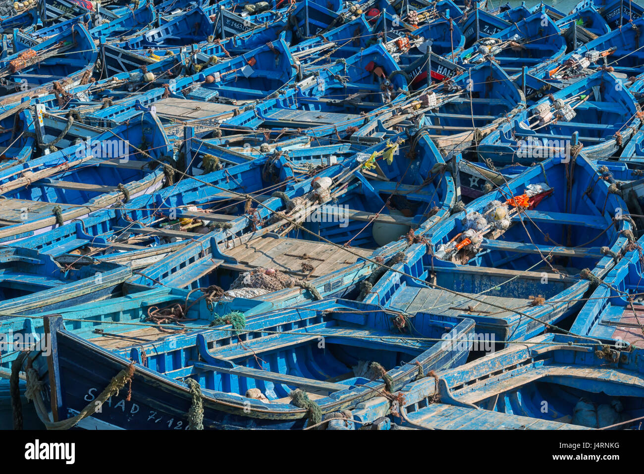 Blue fishing boats in the harbour of Essaouira in Morocco Stock Photo ...