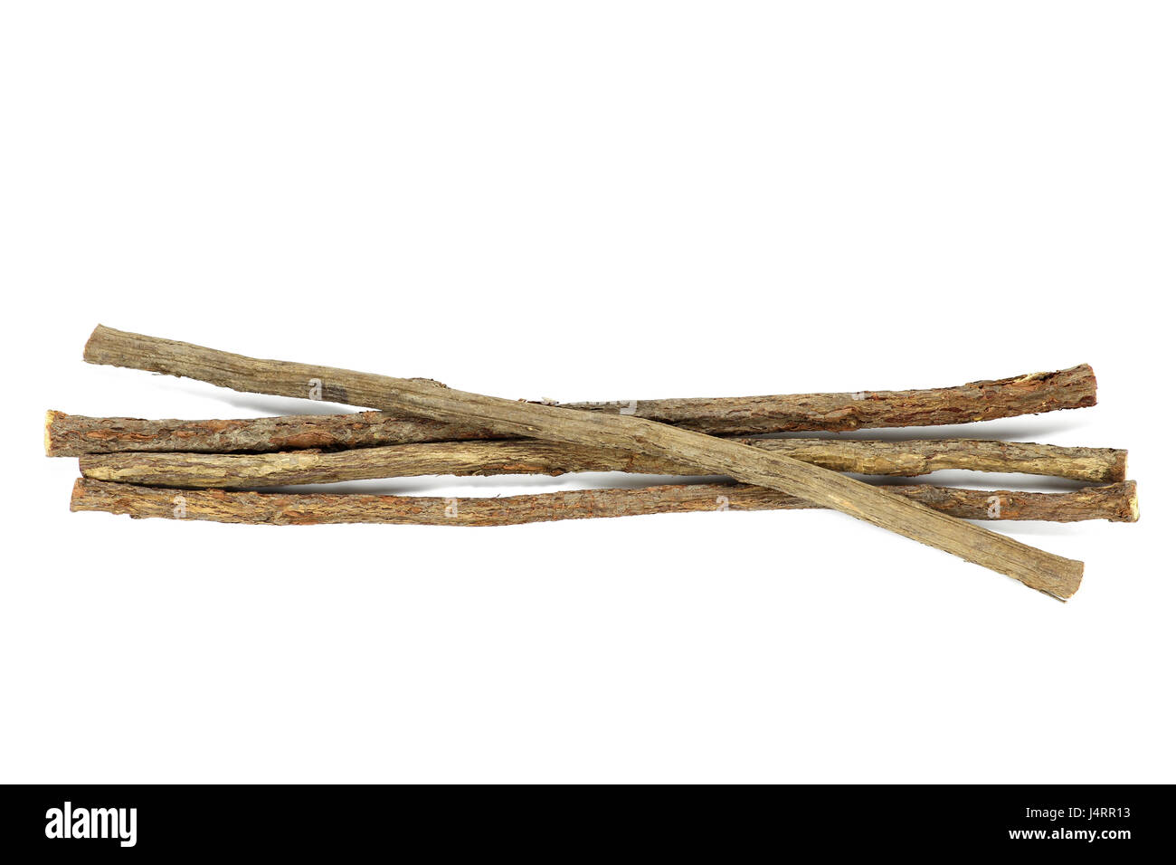 dried sticks of liquorice root isolated on white background Stock Photo ...