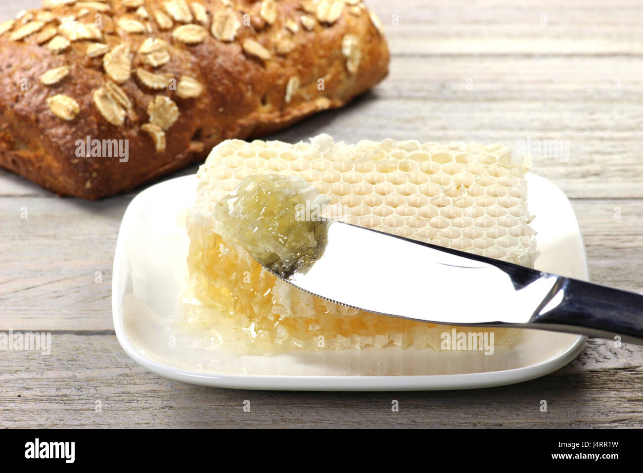 breakfast with comb honey Stock Photo - Alamy