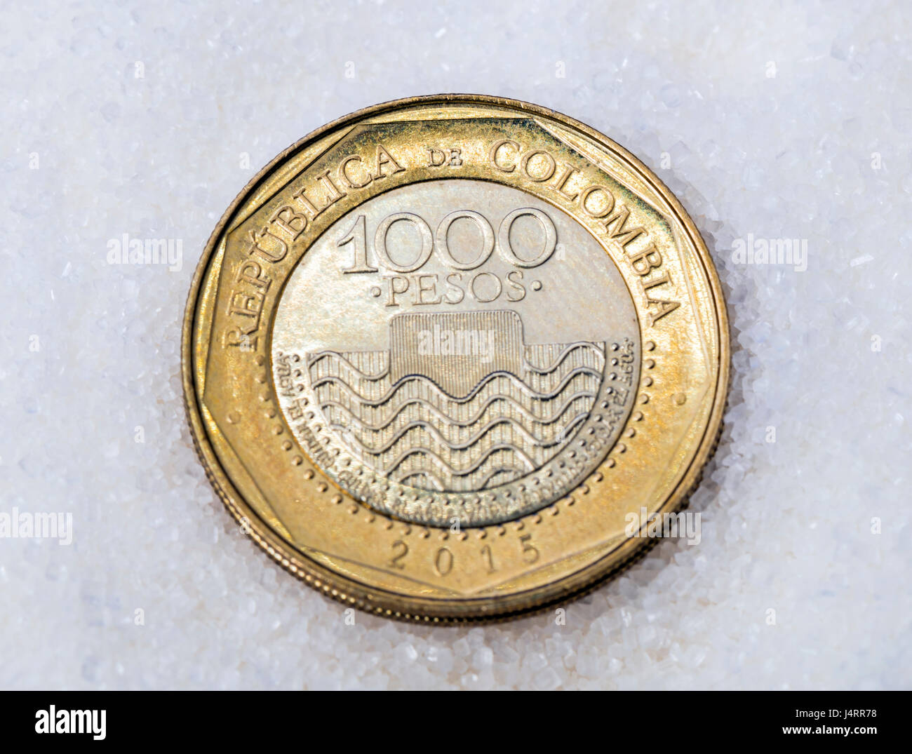 Columbian peso coin Stock Photo - Alamy