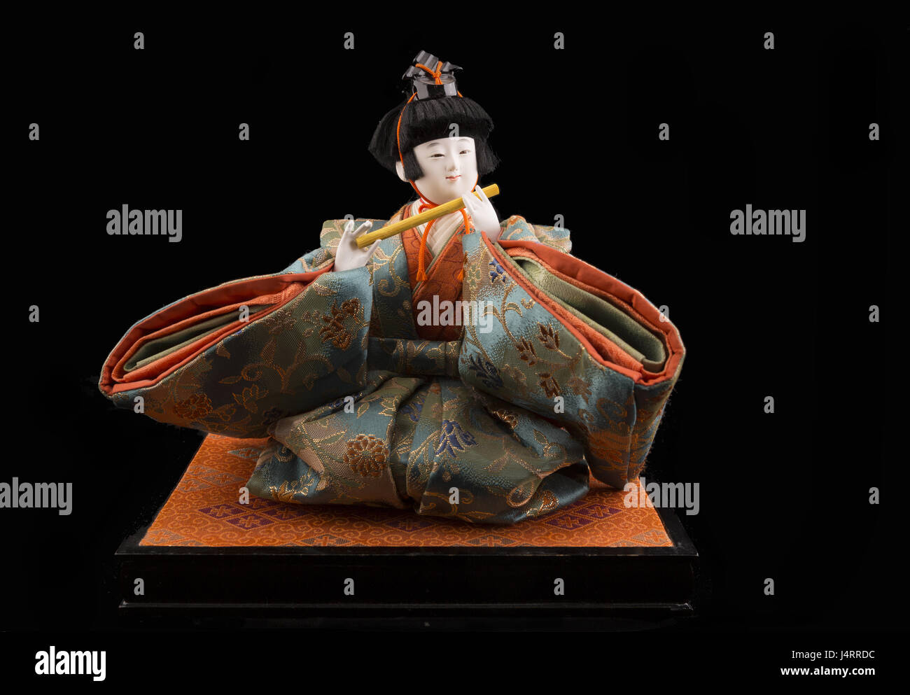 Japanese festive wooden doll Stock Photo - Alamy