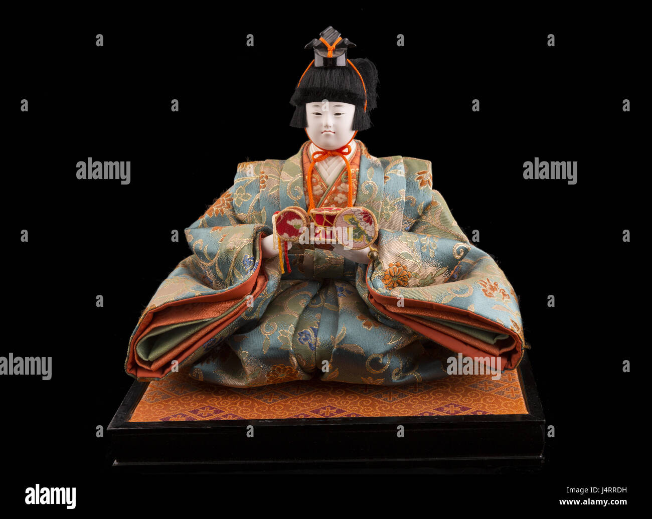 Japanese festive wooden doll Stock Photo - Alamy