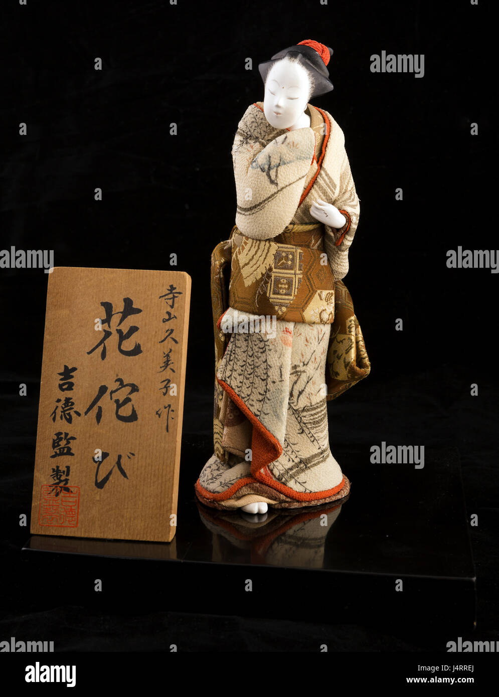 Japanese festive wooden doll Stock Photo - Alamy