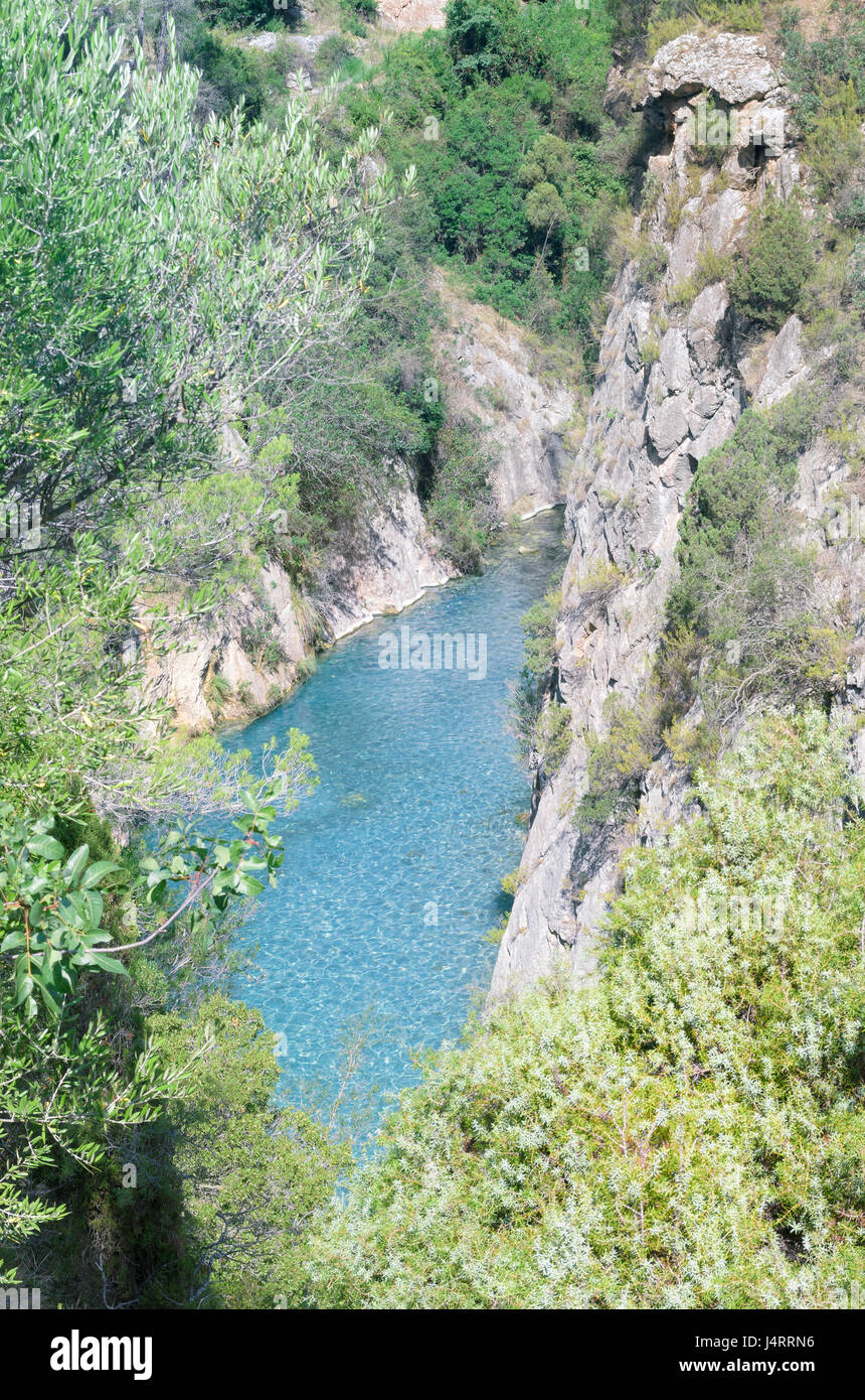 Colorful landscape. Mijares river with waters of beautiful blue colors ...