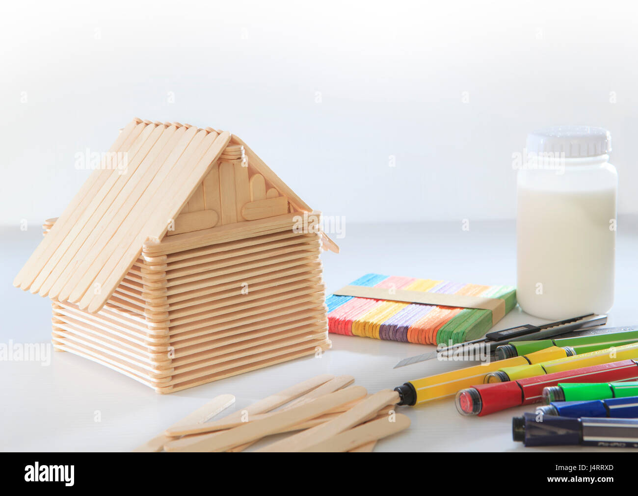 home made from popsicle wood on white background use for children play ...