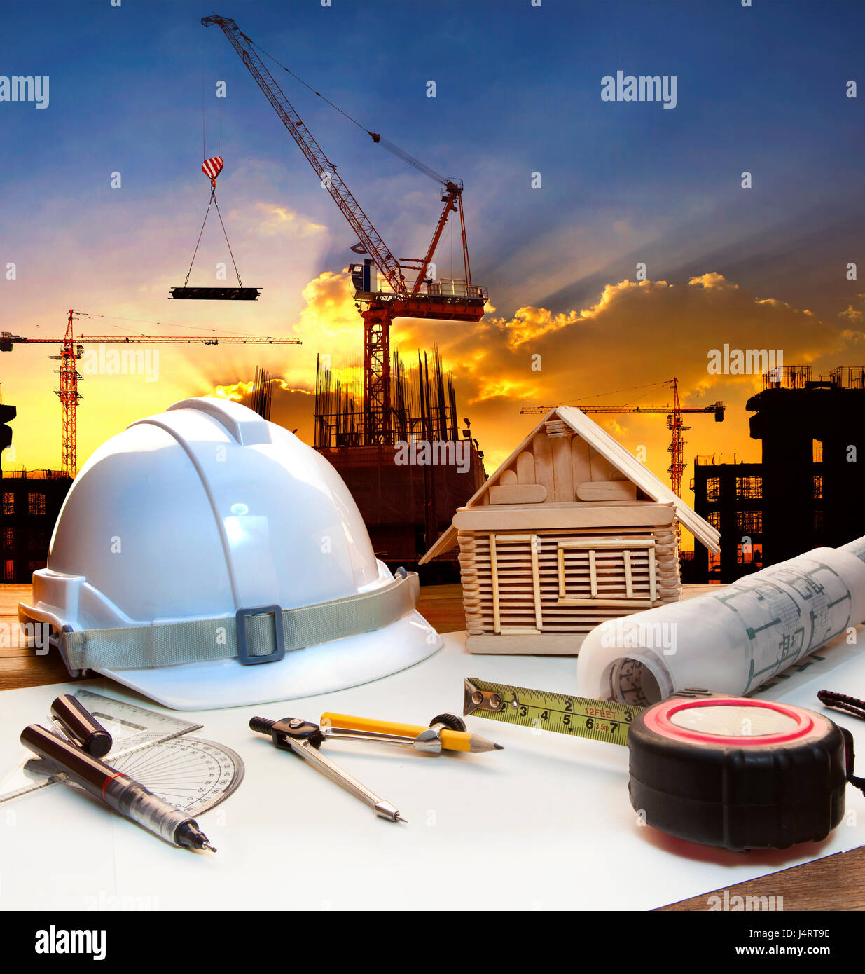 engineer working table plan, home model and writing tool equipment ...