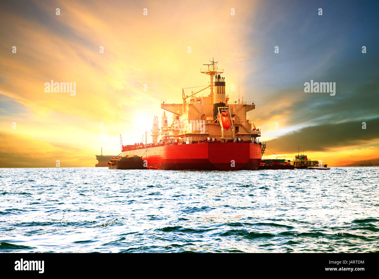 container ship loading goods product at sea harbor port against ...