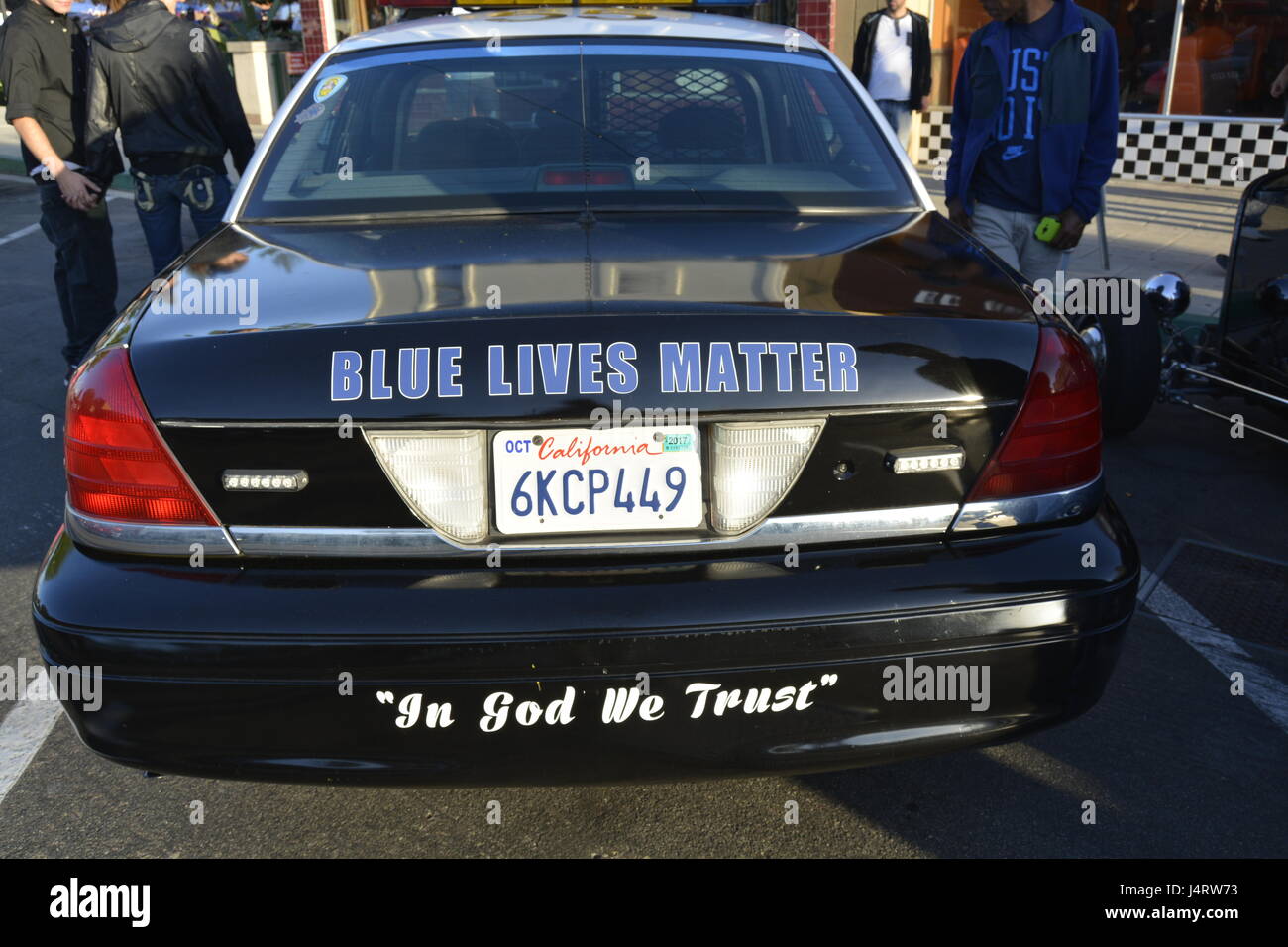 Black cop car hi-res stock photography and images - Alamy