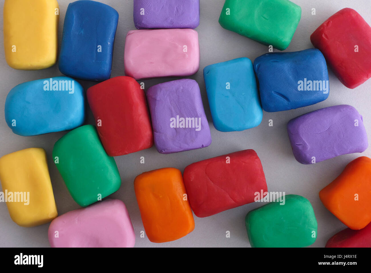 Colorful blocks made out of plasticine. Close up Stock Photo - Alamy