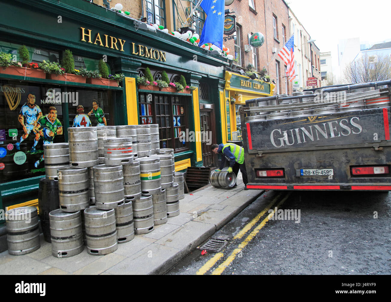 Delivery of Guinness beer barrels to traditional Hairy Lemon pub, city ...