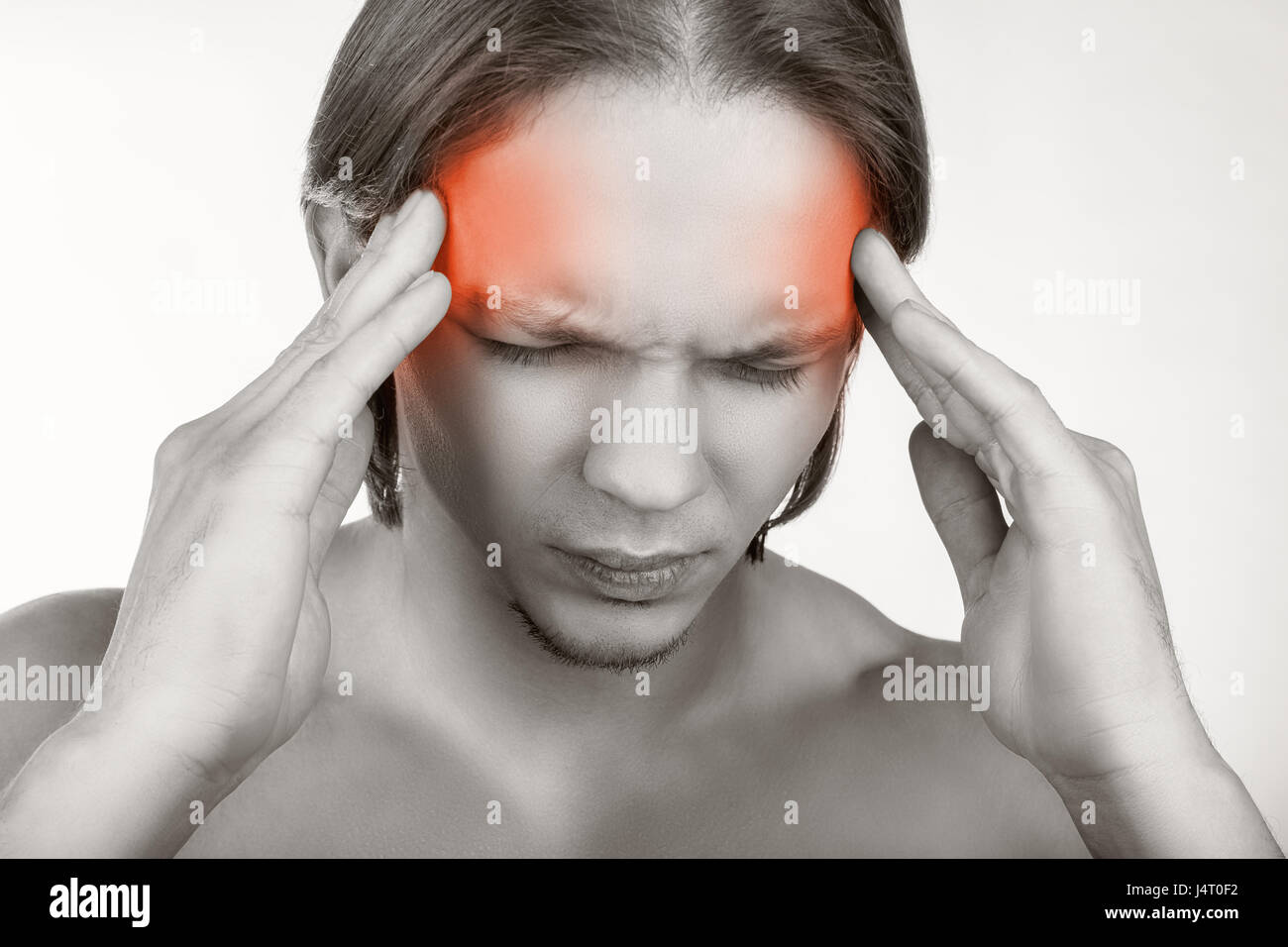 Man with headache isolated on white background Stock Photo - Alamy