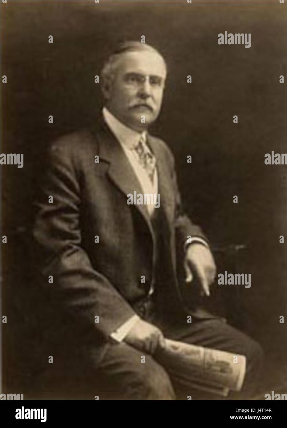 Wheeler portrait seated Stock Photo - Alamy
