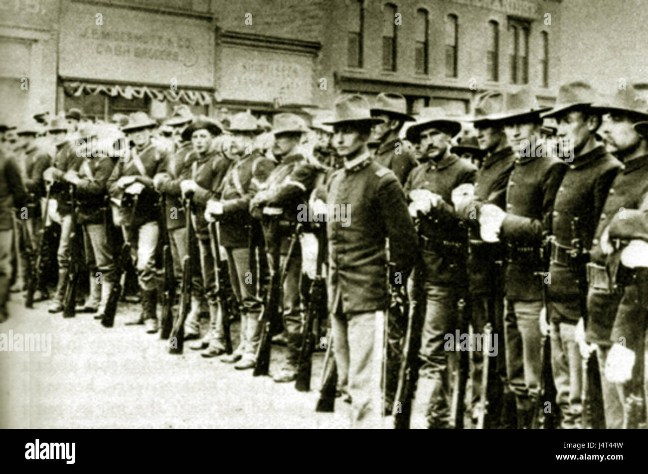 The image from 1885 depicts troops stationed on South Front Street in ...