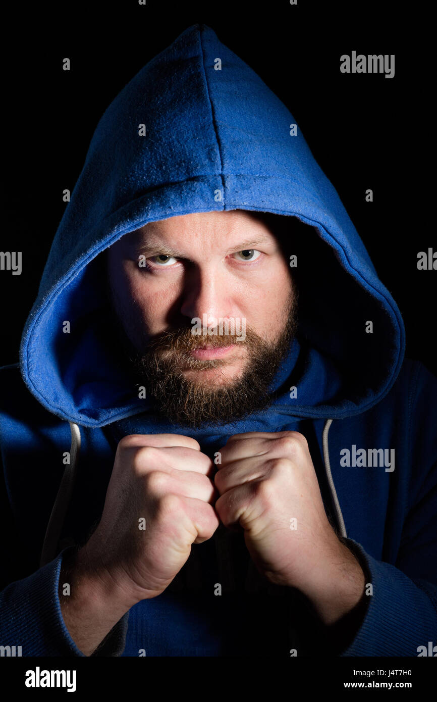 Man face in hood fighter hi-res stock photography and images - Alamy