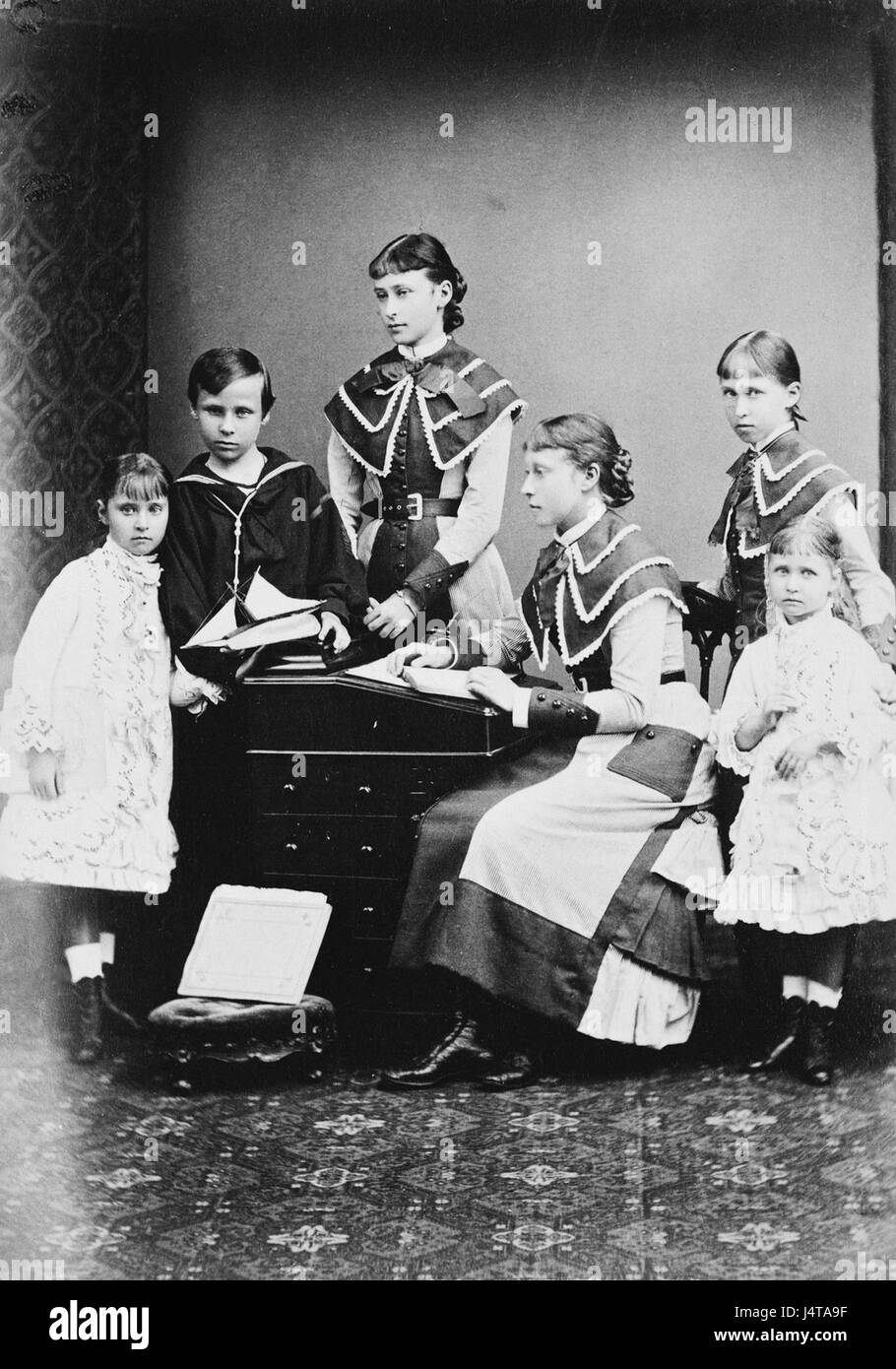 This image depicts a group of Hessian children from 1878. The children ...
