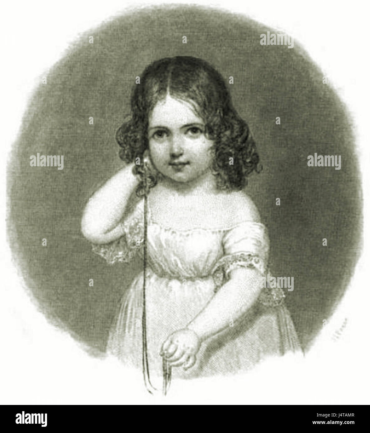 This image captures a child interacting with a watch, possibly ...