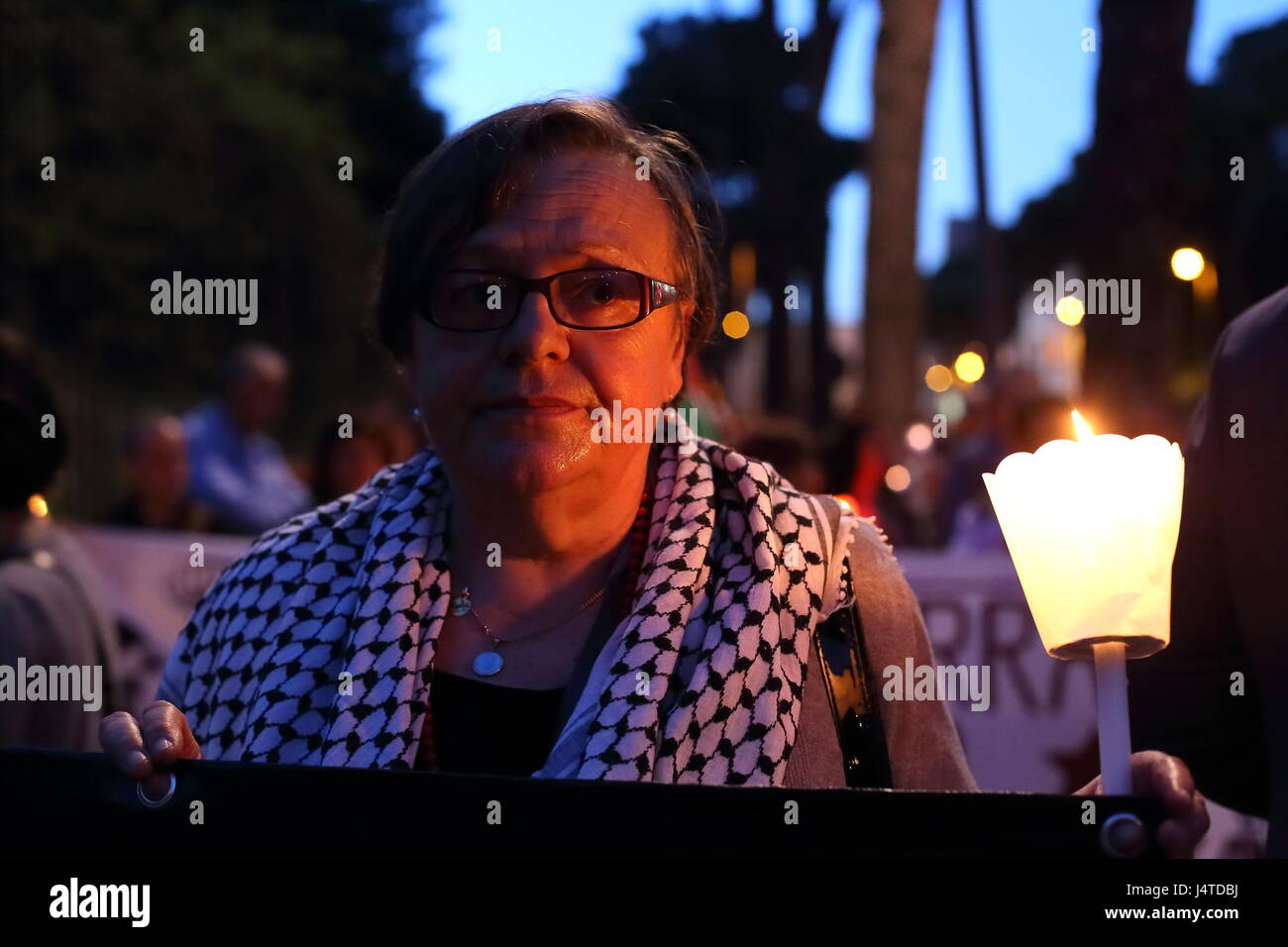 Torch lighting in front of the coliseum in Rome in solidarity with the ...