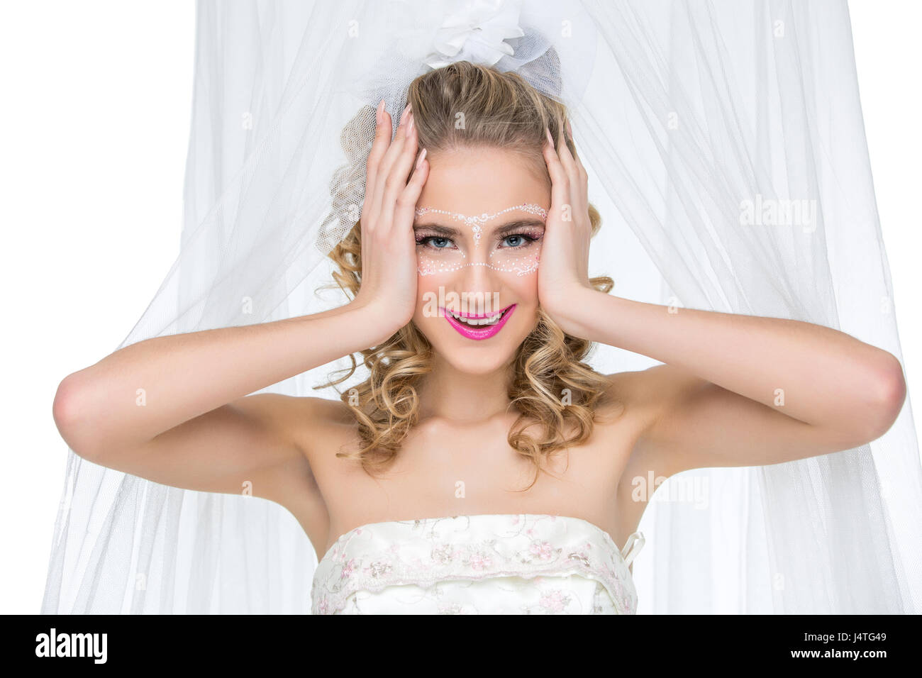 Bride with mask drawn on face Stock Photo - Alamy