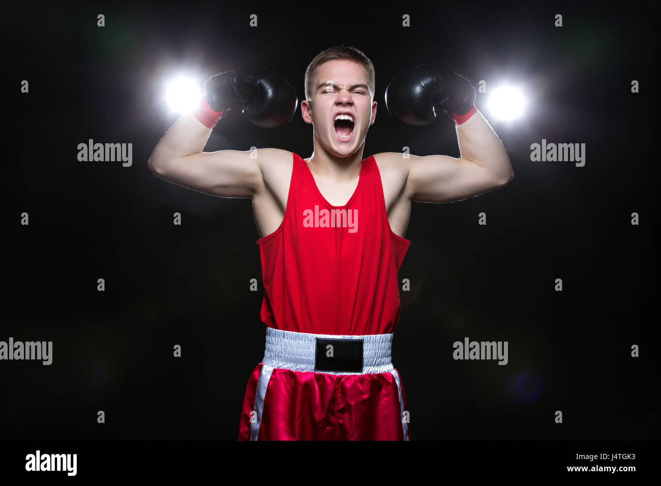 Young boxer in red form Stock Photo - Alamy