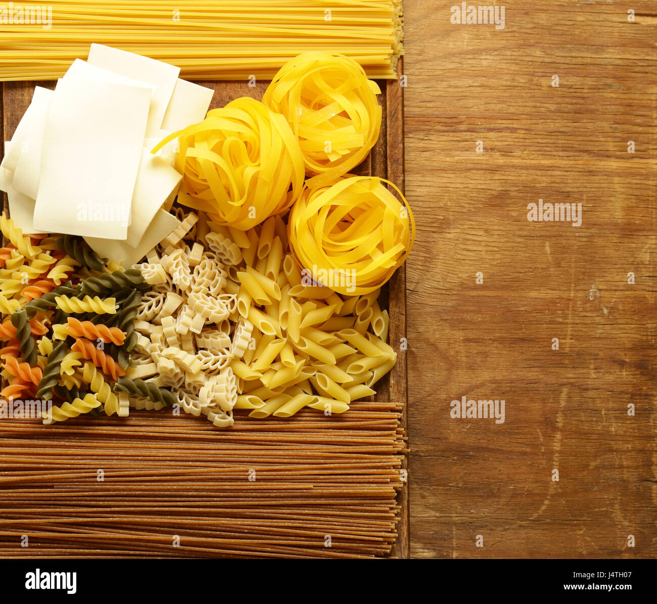 Various types of pasta (spaghetti, penne, fusilli Stock Photo - Alamy