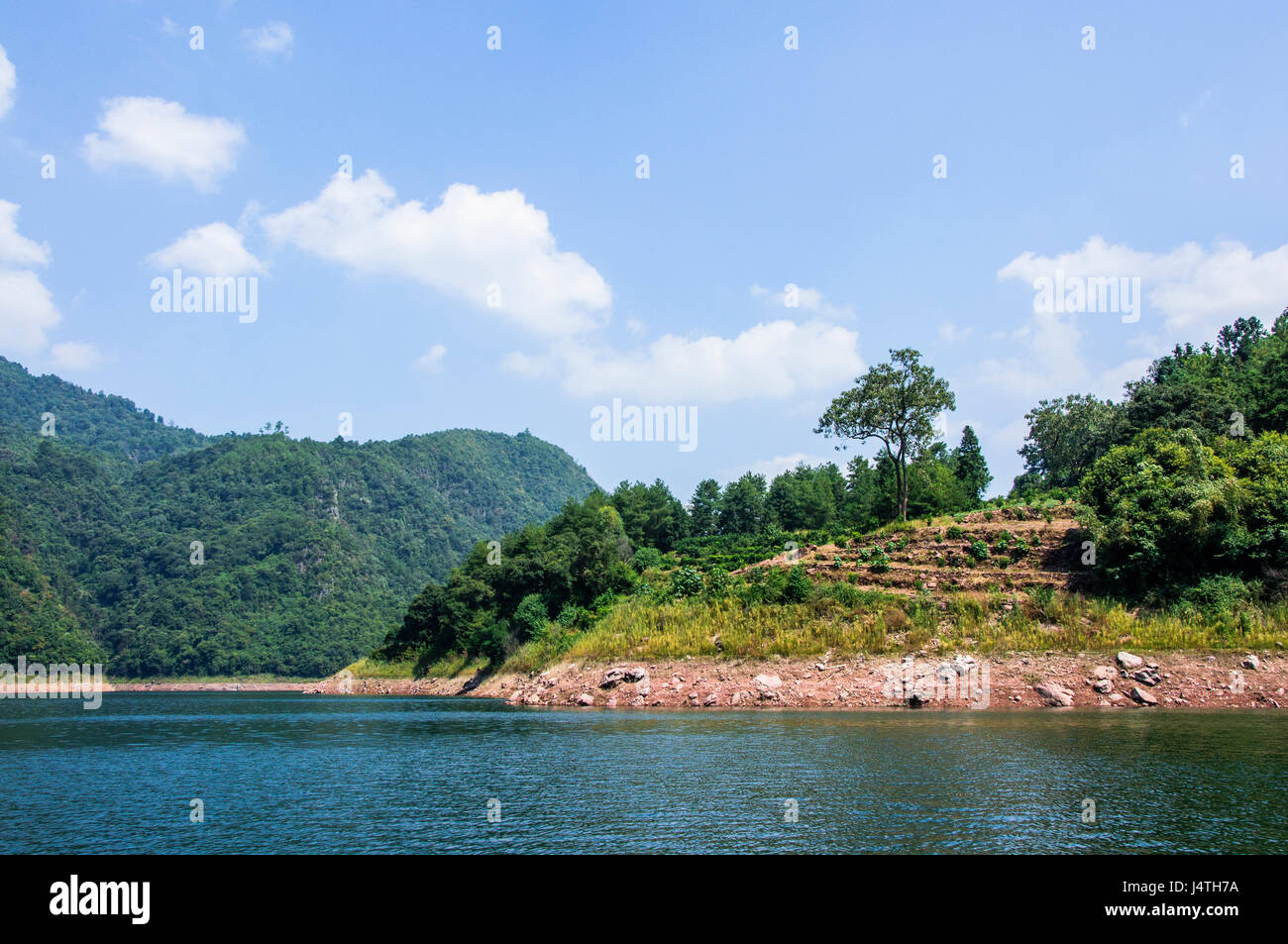 The reservoir scenery with blue sky in summer Stock Photo - Alamy