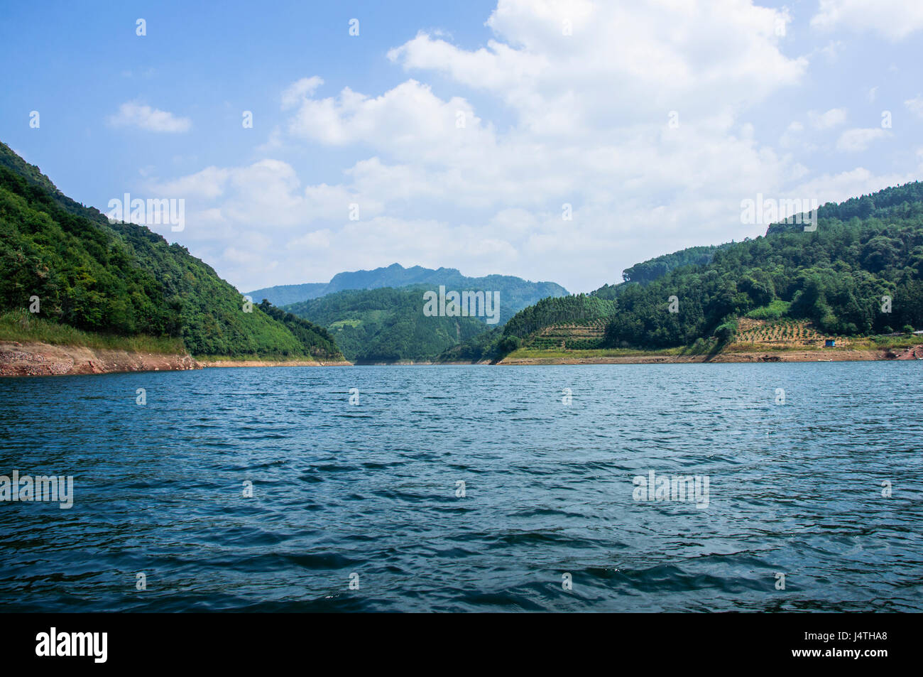 The reservoir scenery with blue sky in summer Stock Photo - Alamy