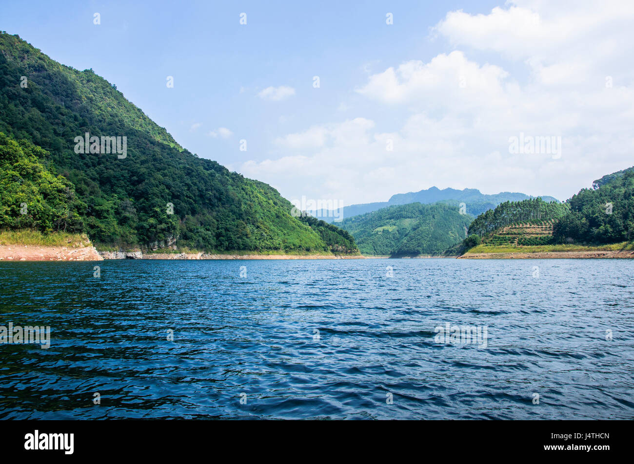 The reservoir scenery with blue sky in summer Stock Photo - Alamy