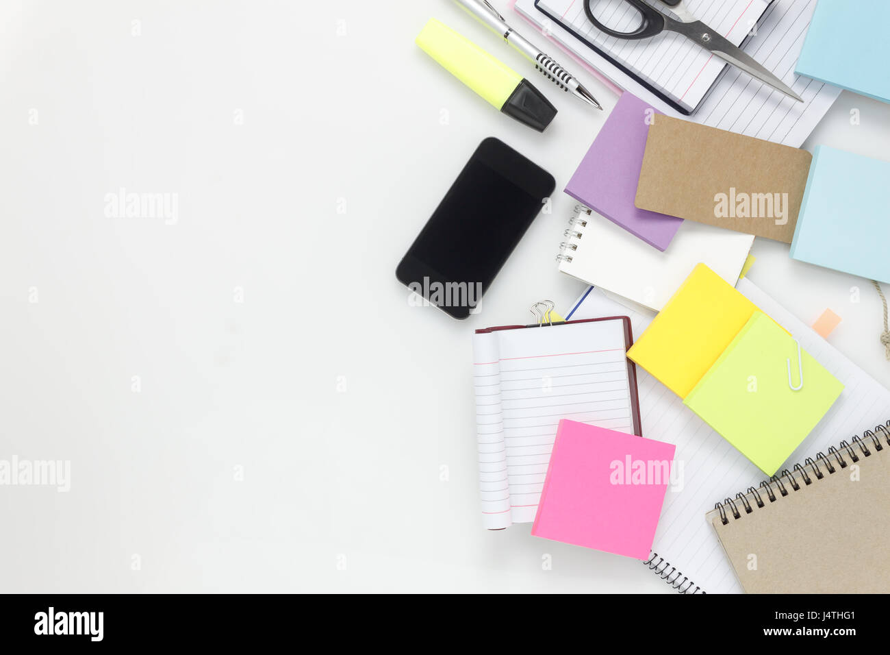 Top view accessories business office desk.Smartphone notebook pen paper ...