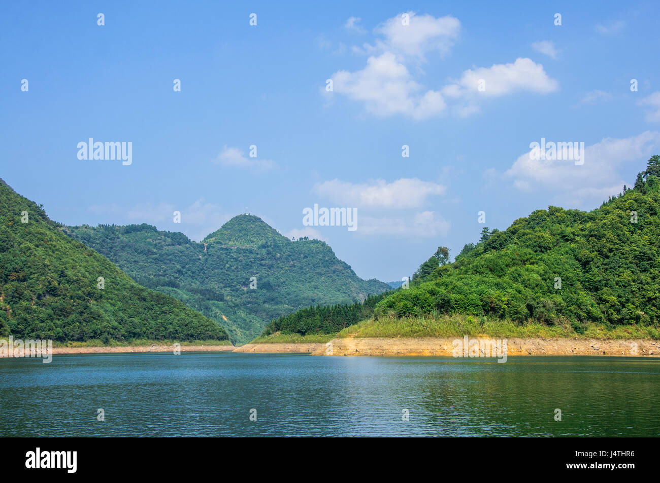 The reservoir scenery with blue sky in summer Stock Photo - Alamy