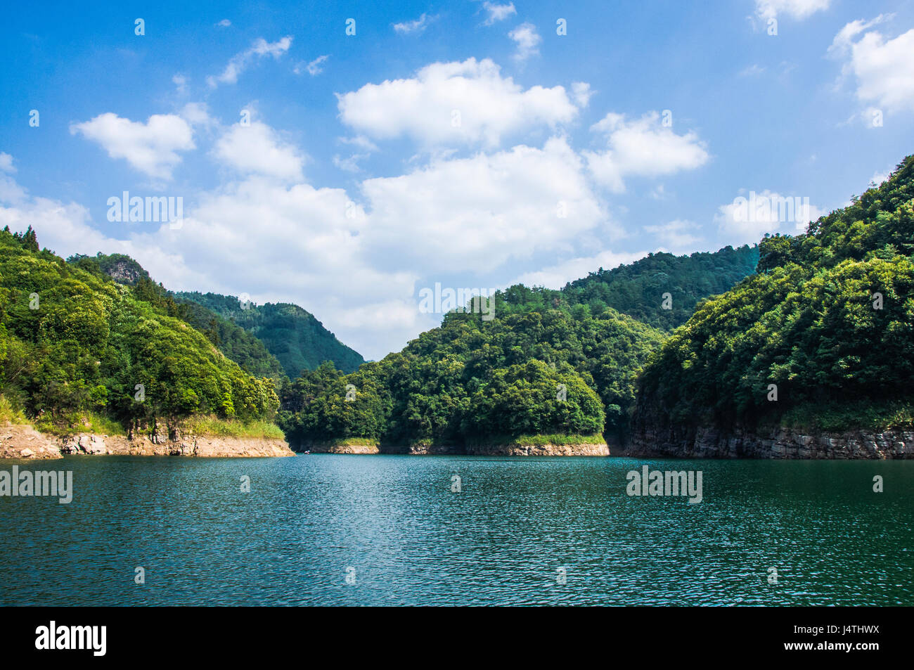 The reservoir scenery with blue sky in summer Stock Photo - Alamy