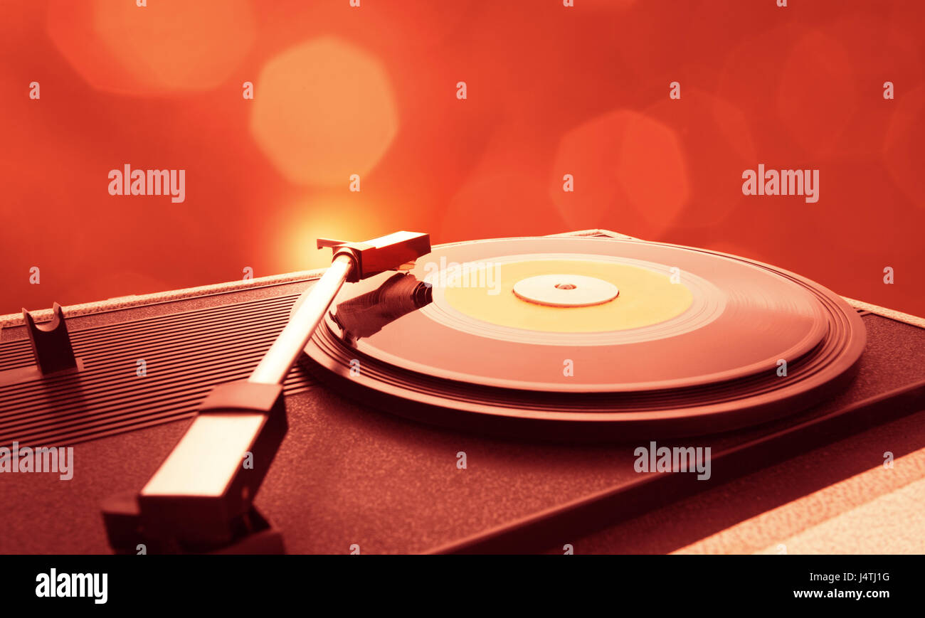 A vinyl record is spinning on the turntable Stock Photo - Alamy